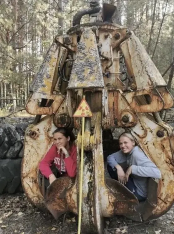 Harrowing truth behind photo of two women sitting on 'Chernobyl’s most ...