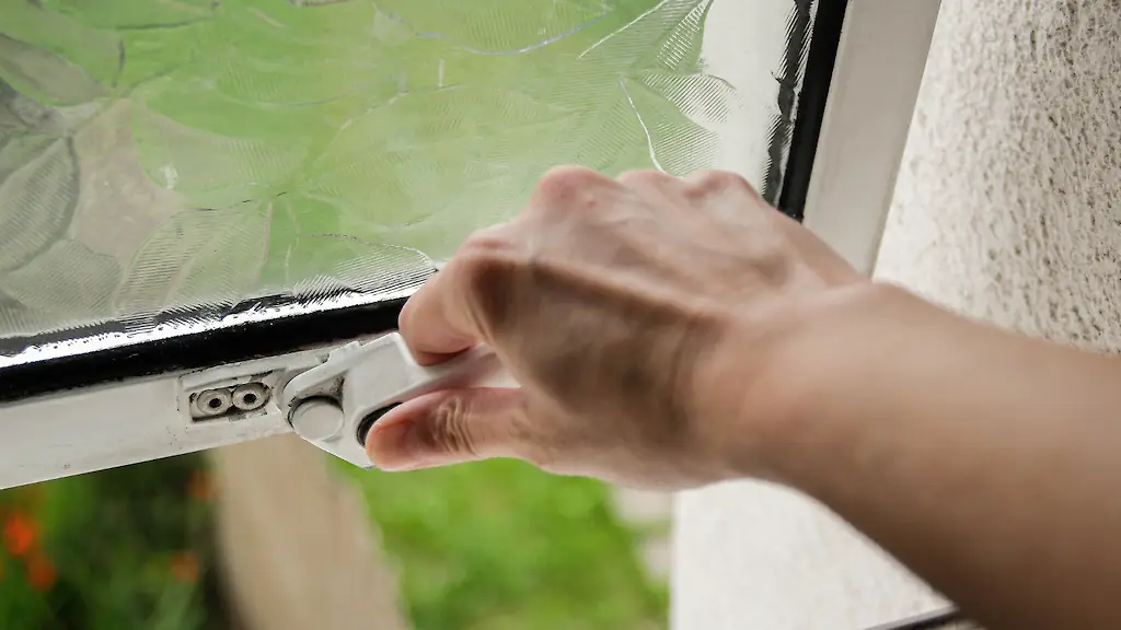 Woman who attempted to climb through window but ended up trapped upside ...